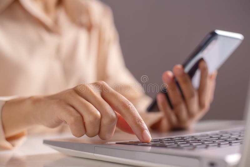 Woman Hand Enter a One Time Password for the Validation Process on ... Woman Hand Enter a One Time Password for the Validation Process on ...
