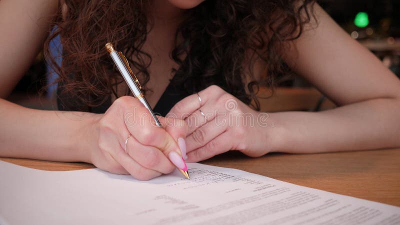 Woman Hand Filling Form on a Table Stock Video - Video of woman ...