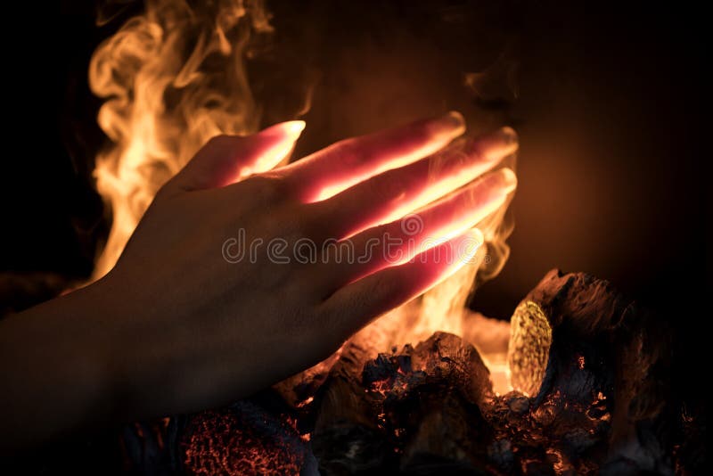 Woman hand on fire stock image. Image of closeup, danger - 81679063