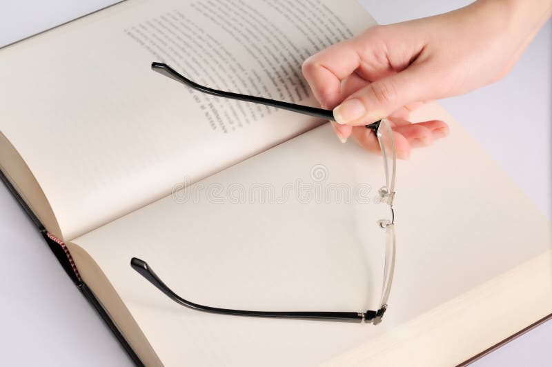 Woman Hand with Glasses on Book Stock Image - Image of pages, learn ...