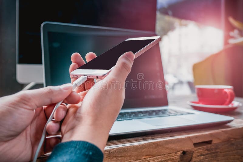 Woman Hand Hold the Charging Cable Plugging the Smart Mobile Phone ...