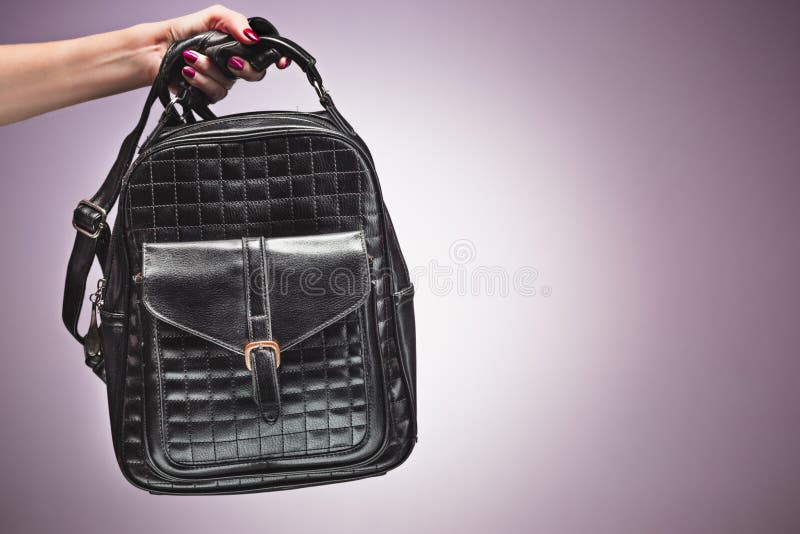 Woman Hand Holding Backpack Stock Image - Image of knapsack, childhood ...