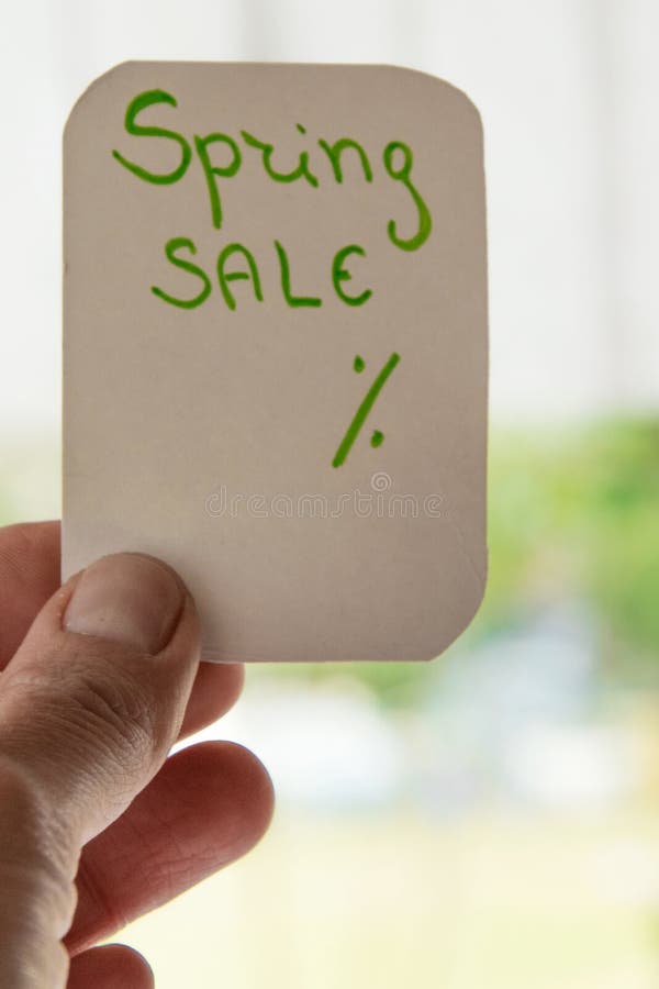 Woman Hand Holding a Card Message for Spring Sale Stock Photo - Image ...