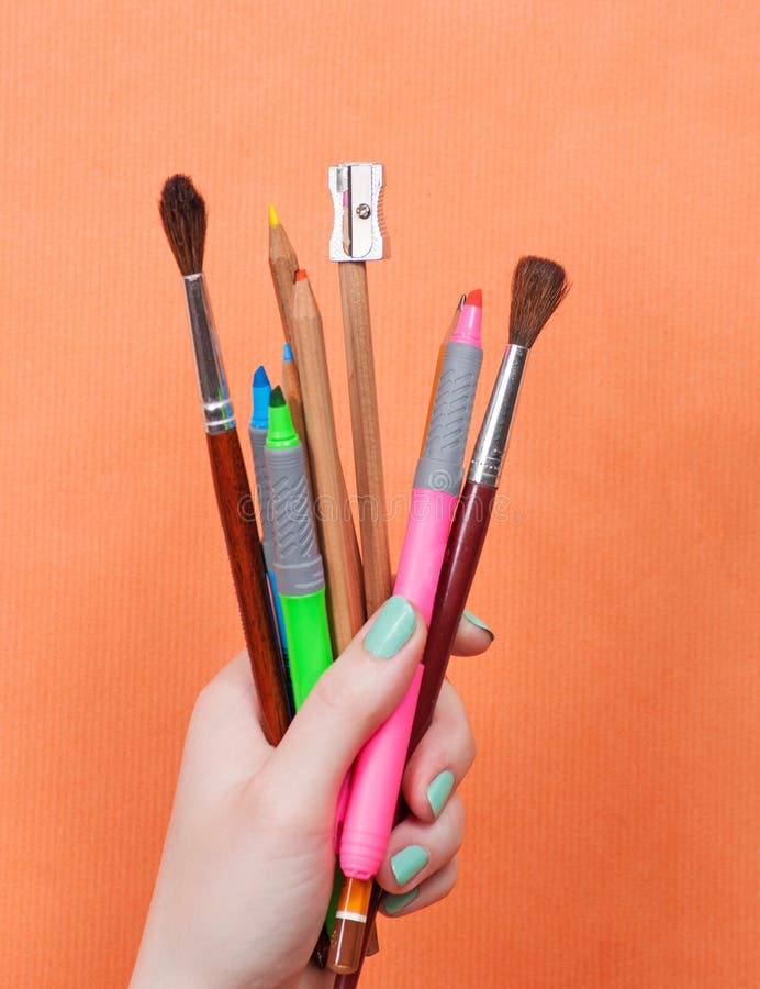 Woman Hand Holding Colorful Art Tools Orange Stock Photos - Free ...