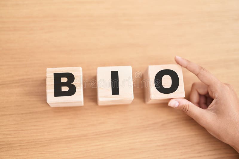 Woman Hand Holding Cubes with Bio Word on the Table Stock Photo - Image ...
