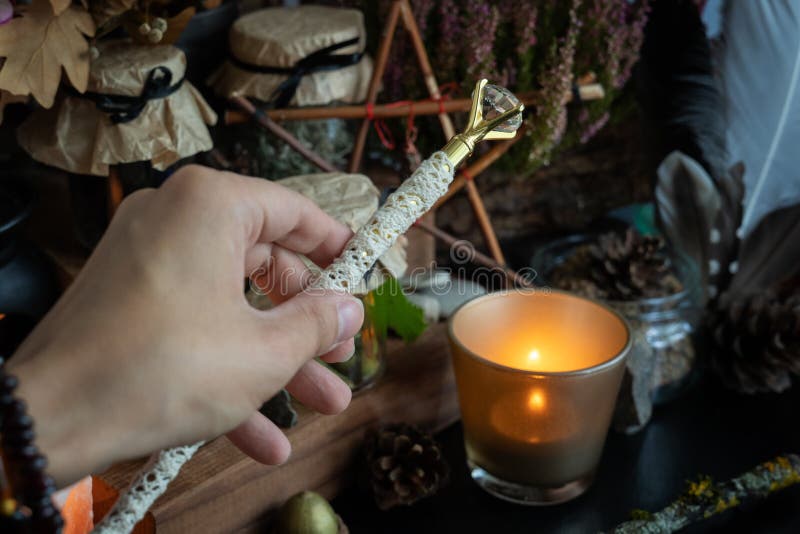 Woman Hand is Holding Magic Wand Performing a Pagan Ritual. Stock Image ...