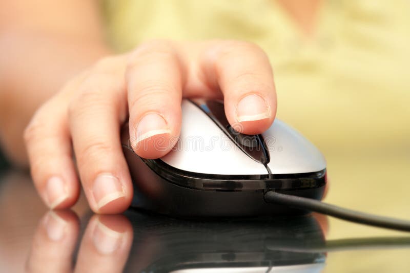 Woman hand holding mouse stock photo. Image of computer - 41897628