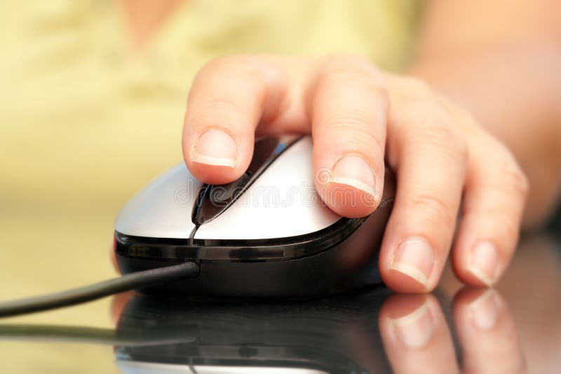 Woman hand holding mouse stock photo. Image of office - 42163168