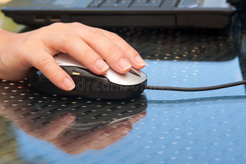 Woman hand holding mouse stock photo. Image of finance - 40912664