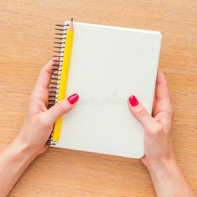 Woman Hand Holding Notebook Stock Image - Image of diary, human: 44199553