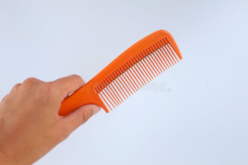 Orange comb stock image. Image of grooming, utensil, plastic - 19023641