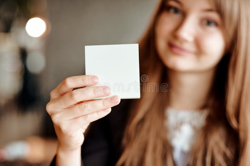 Business Woman Hand Holding Square Blank Clean Sticker Mock Up. Close ... Business Woman Hand Holding Square Blank Clean Sticker Mock Up. Close ...