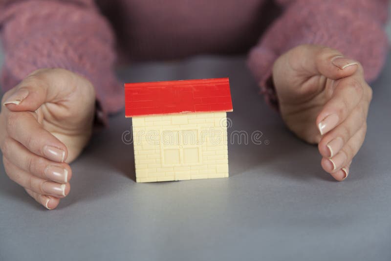 Woman Hand House Model on Desk Stock Image - Image of purchase, house ...