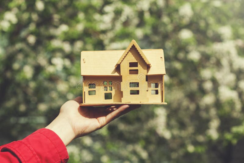 Woman hand house model stock image. Image of housing - 146859209