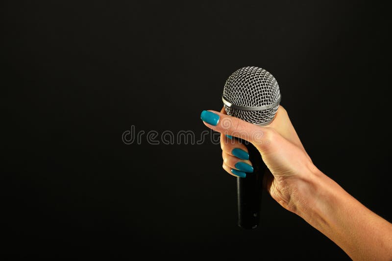 Girl holding microphone stock image. Image of microphone - 25752739