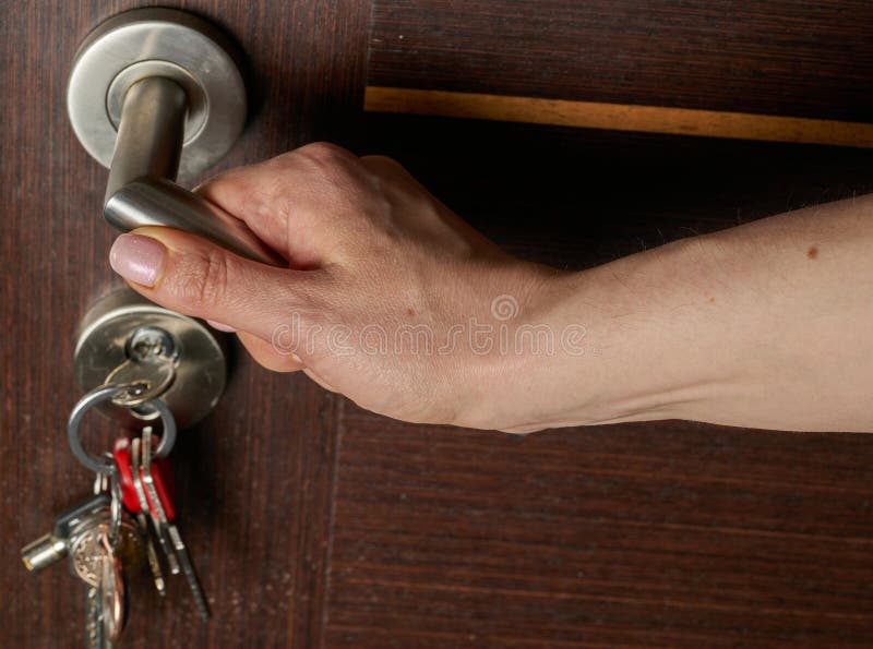Hand reaching for doorknob stock image. Image of pale - 12111801