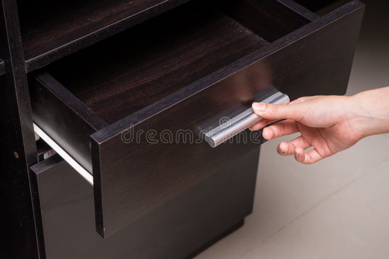 Woman hand open drawer stock photo. Image of lady, asian - 70506976