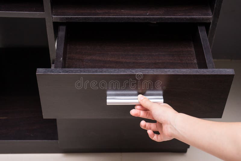 Woman hand open drawer stock image. Image of detail, furniture - 70507463