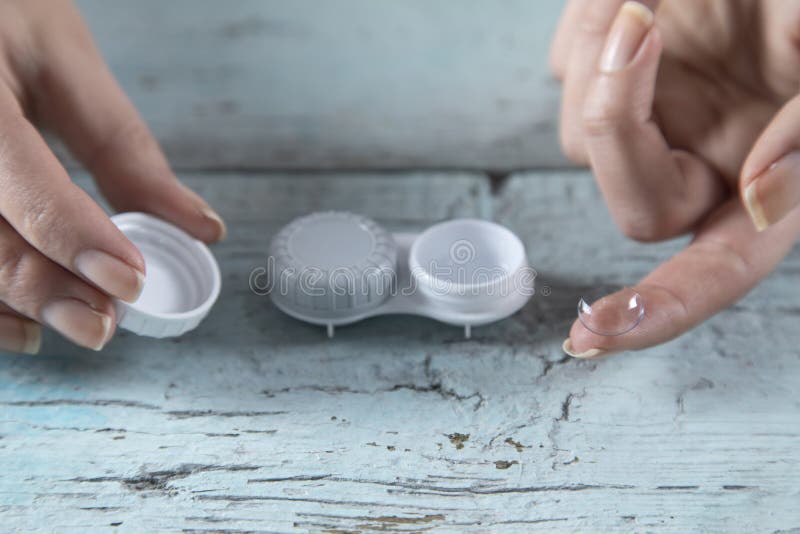 Woman hand optical lenses stock photo. Image of healthy - 186701216