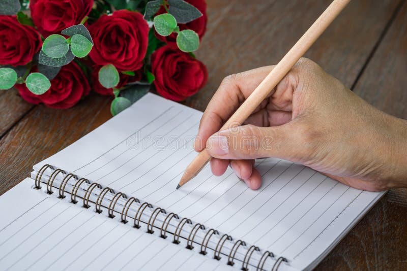 Woman Hand with Pencil Writing on Notebook Stock Photo - Image of ...