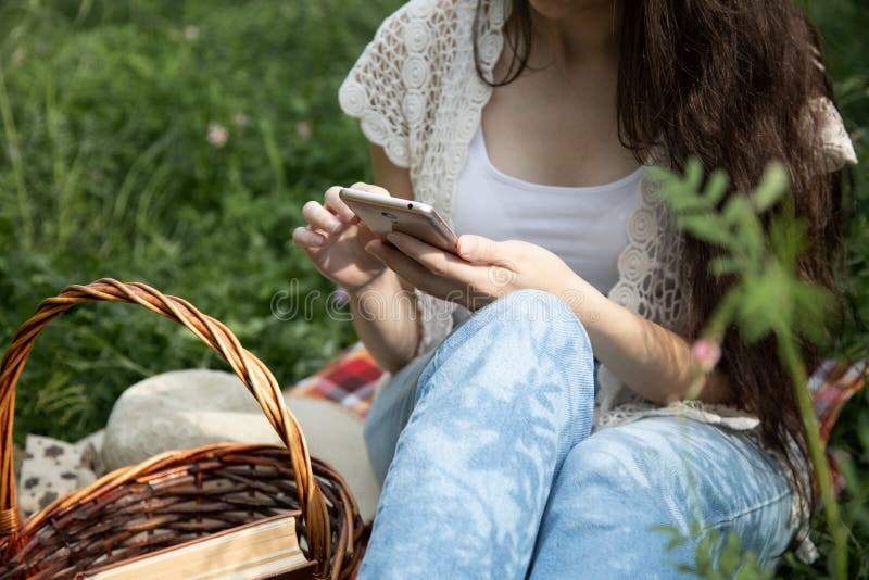 Woman hand phone in garden stock image. Image of garden - 262960423