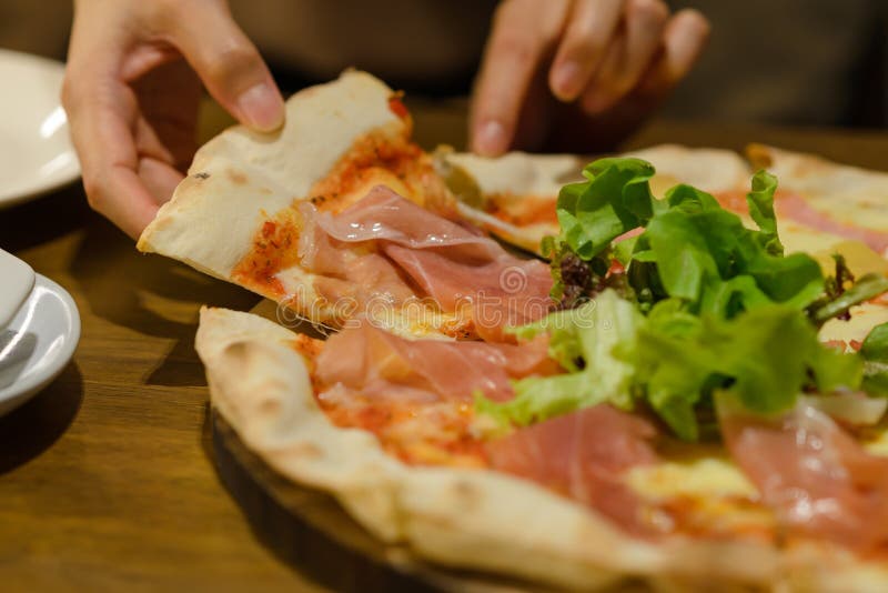 Woman Hand Picking Slice of Fresh Parma Ham Pizza Stock Photo - Image ...