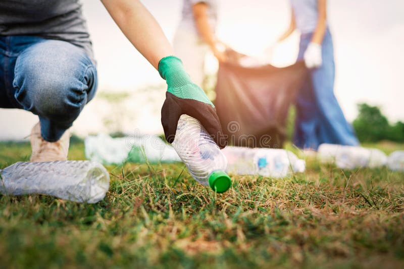 Woman Hand Picking Up Garbage Plastic Bottle for Cleaning at Park Stock ...