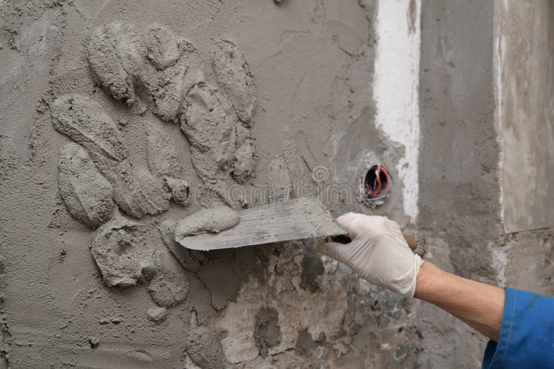 Woman Hand Plastering Concrete at Wall of House Stock Photo - Image of ...