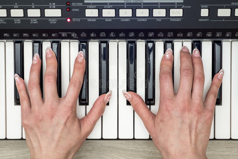 Woman Hand Playing a MIDI Controller Keyboard Synthesizer Close Up ...