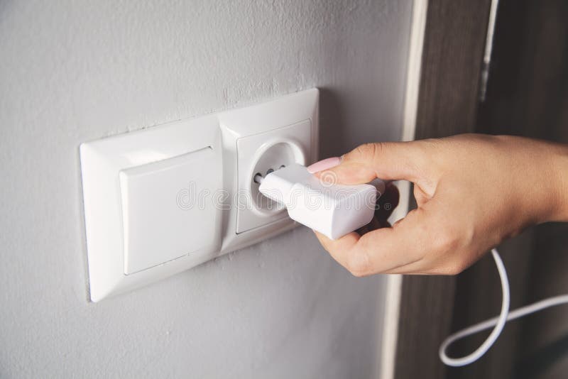Woman hand plug stock photo. Image of wire, female, electricity - 176567526