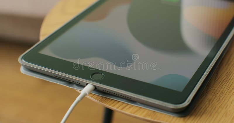 Woman Hand Plugging Charging Cable into Pc Digital Tablet. Close Up ...