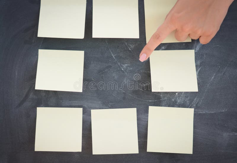 Woman Hand Posting Empty Adhesive Notes on Blackboard Stock Photo ...