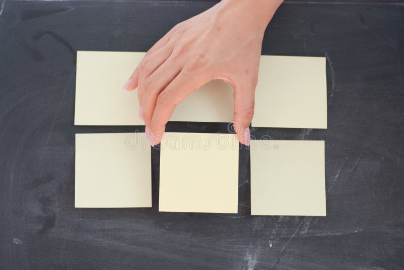 Hand Posting We`re Back Sign On Door Front. Back To Business Concept ...