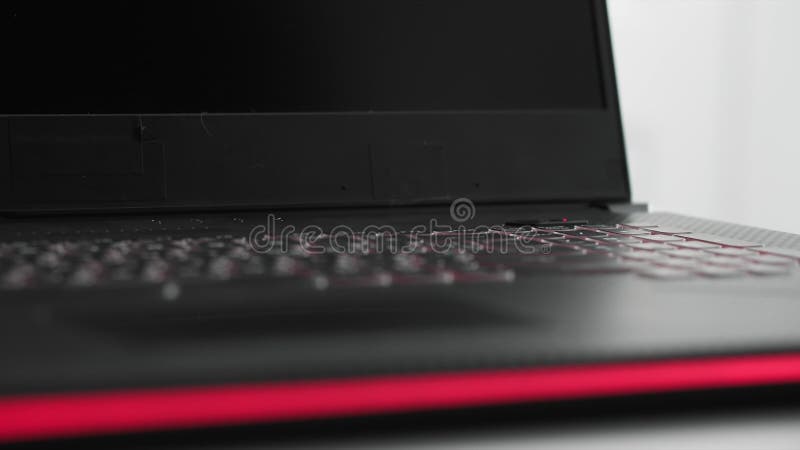 A Woman Hand Presses Laptop Power Button, Then Computer Backlight Turns ...