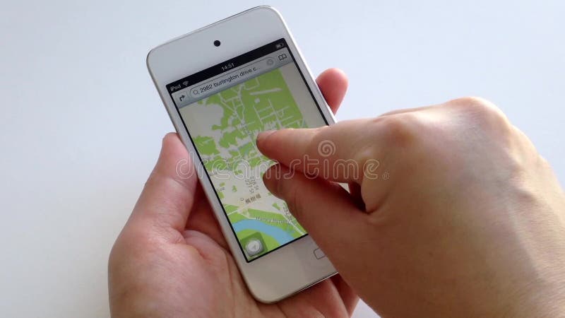 Woman Hand Searching Map with the Index Finger on Smart Device Stock ...