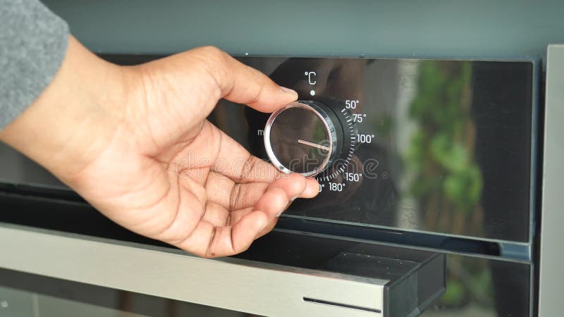 Woman Hand Setting Temperature Control on Oven. Stock Footage - Video ...