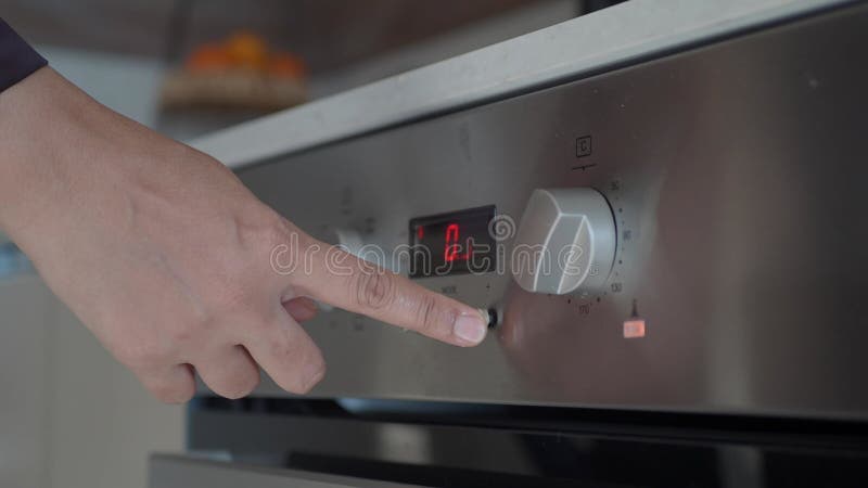 Woman Hand Setting Temperature Control on Oven. Stock Video - Video of ...