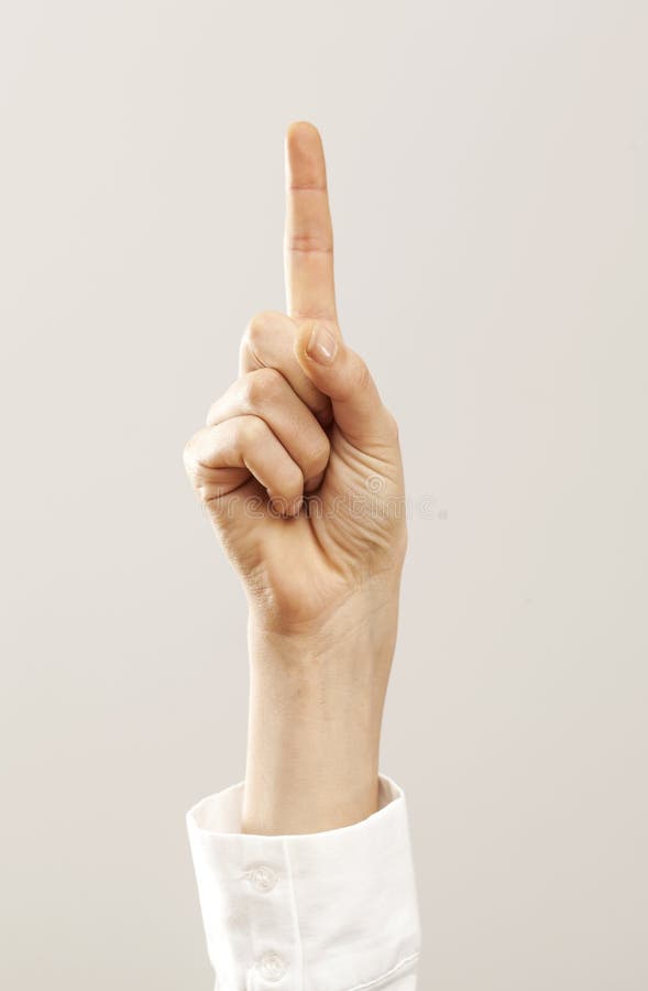 Woman Hand Showing Forefinger Stock Photo - Image of raised, signal ...