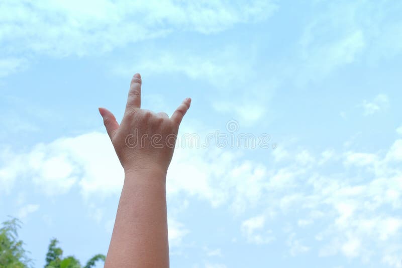 Woman Hand Showing Something on the Blue Sky Stock Image - Image of ...