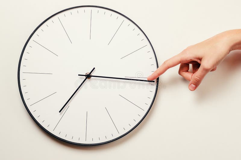 Woman Hand Stop Time on a Round Clock, Time Management and Deadline ...