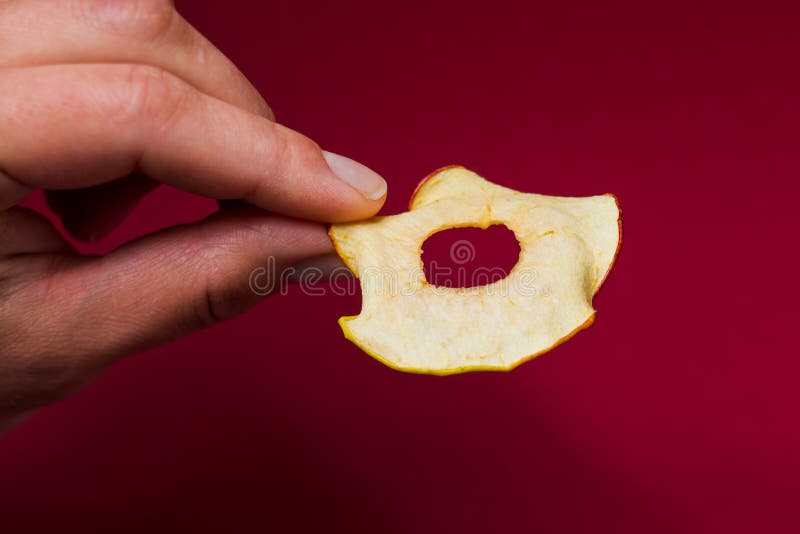Woman Hand Take a Round Dried Slice of Apple Stock Image - Image of ...