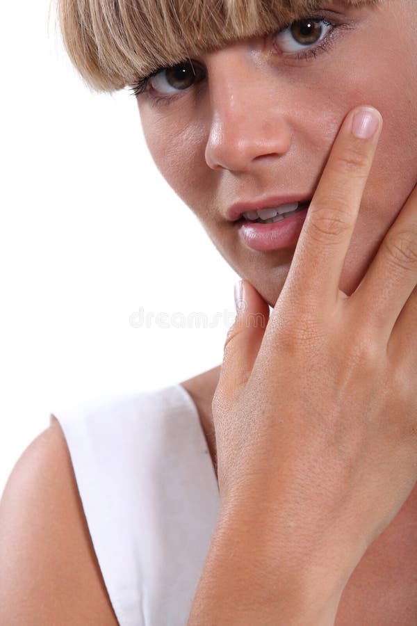 Woman with hand to face stock photo. Image of happiness - 33936678