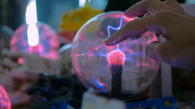 Woman Hand Touching Plasma Ball Stock Photo - Image of ball, laser ...