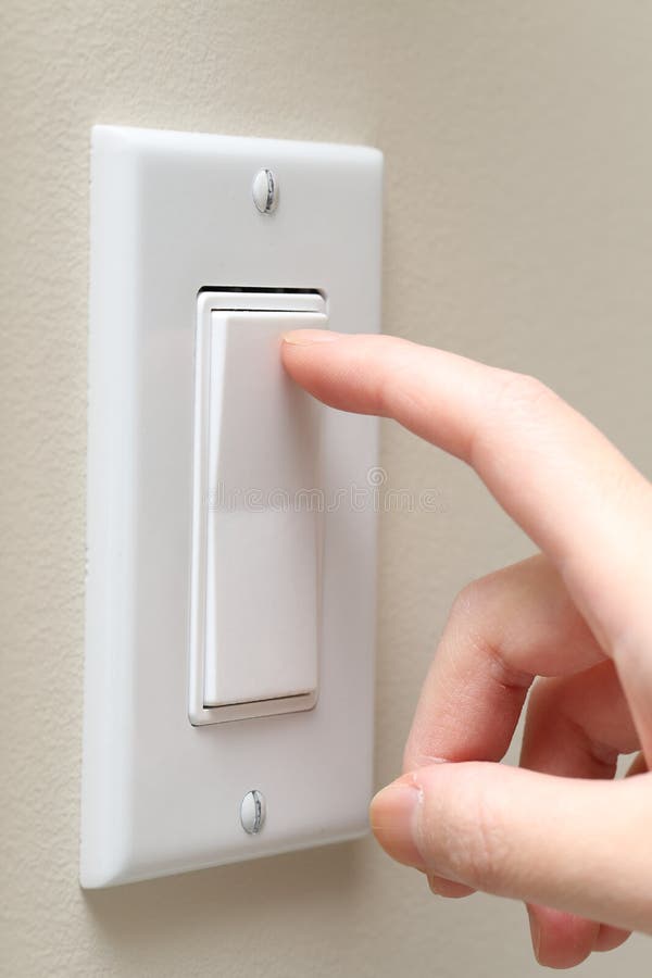Woman Turning Off Light Switch Stock Image - Image of electricity ...
