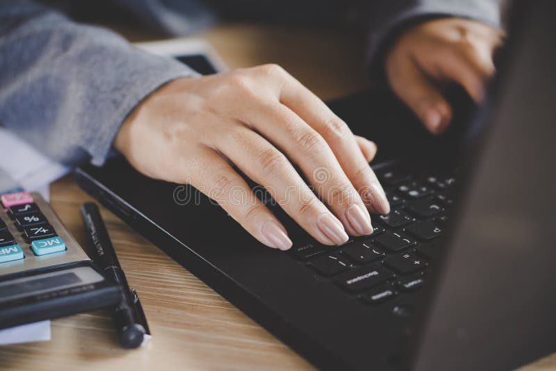 Woman Hand Using Computer Laptop Typing on Keyboard Sitting at Office ...