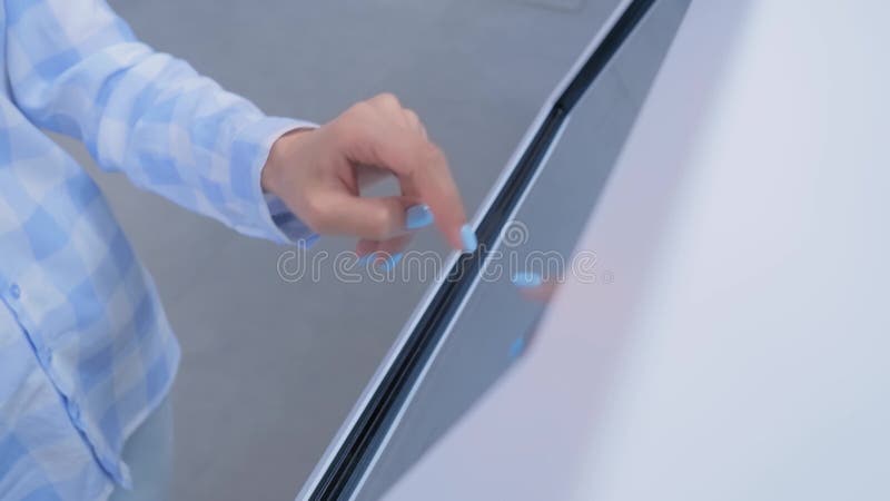 Woman Using Multimedia Touchscreen Display of Interactive Kiosk at ...