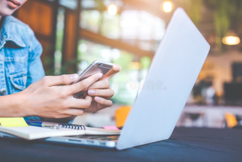 Woman Hand Using a Mobile Phone Works in the Office. Stock Image ...