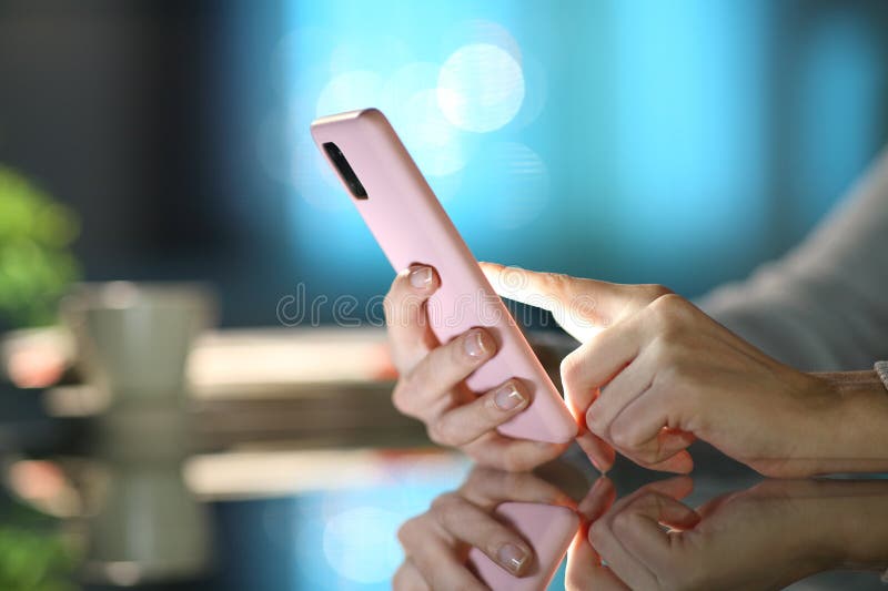 Woman Hand Using Pink Phone in the Night at Home Stock Photo - Image of ...