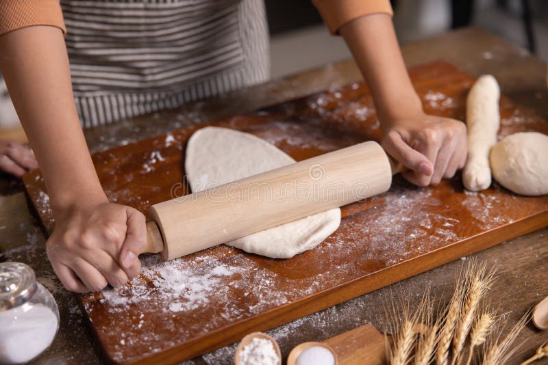 Woman Hand Using Rolling Pin Kneading the Dough Stock Photo - Image of ...