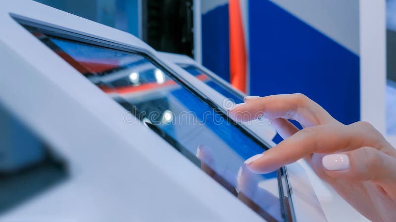 Woman Hand Using Multimedia Touchscreen Display of Interactive Kiosk ...